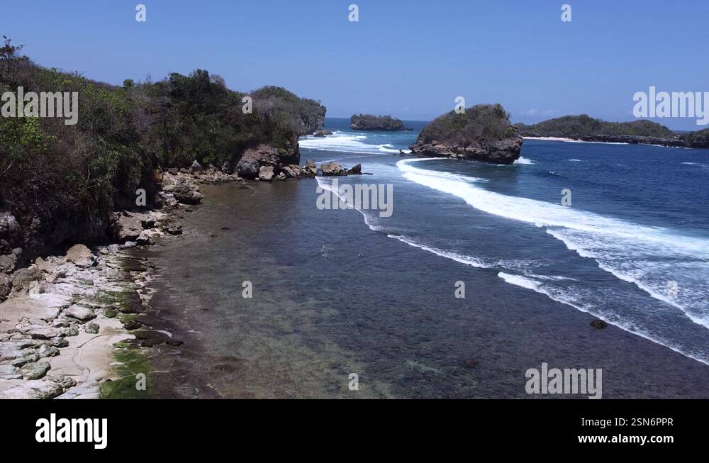 Peh Pulo Beach is located in the tropics, has white sand and a very ...