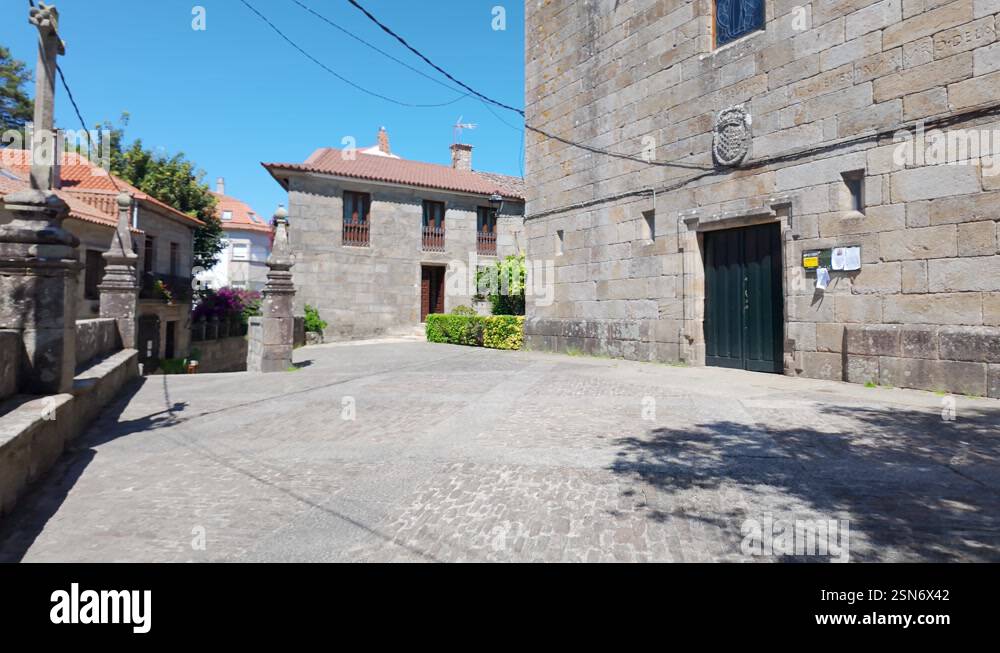Narrow streets with very old stone buildings in the city of Cambados ...