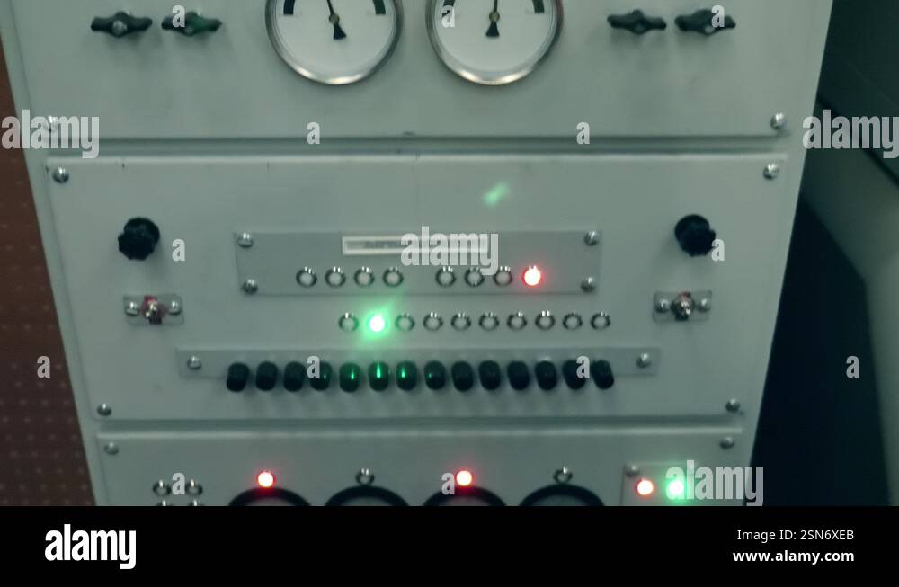 Old control panel with buttons, lights, measuring instruments for ...
