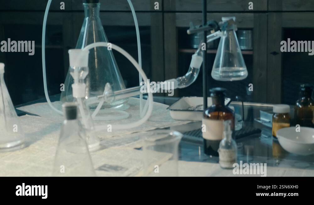 Chemistry lab with lots of beakers, test tubes, flasks, spirit lamps ...