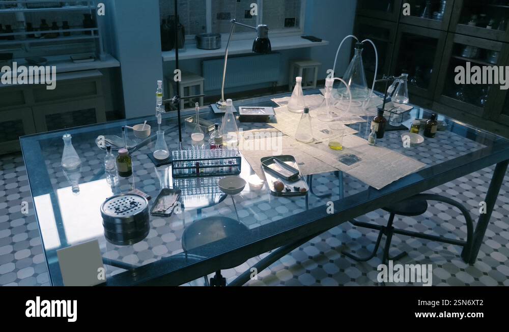 Chemistry lab with lots of beakers, test tubes, flasks, spirit lamps ...