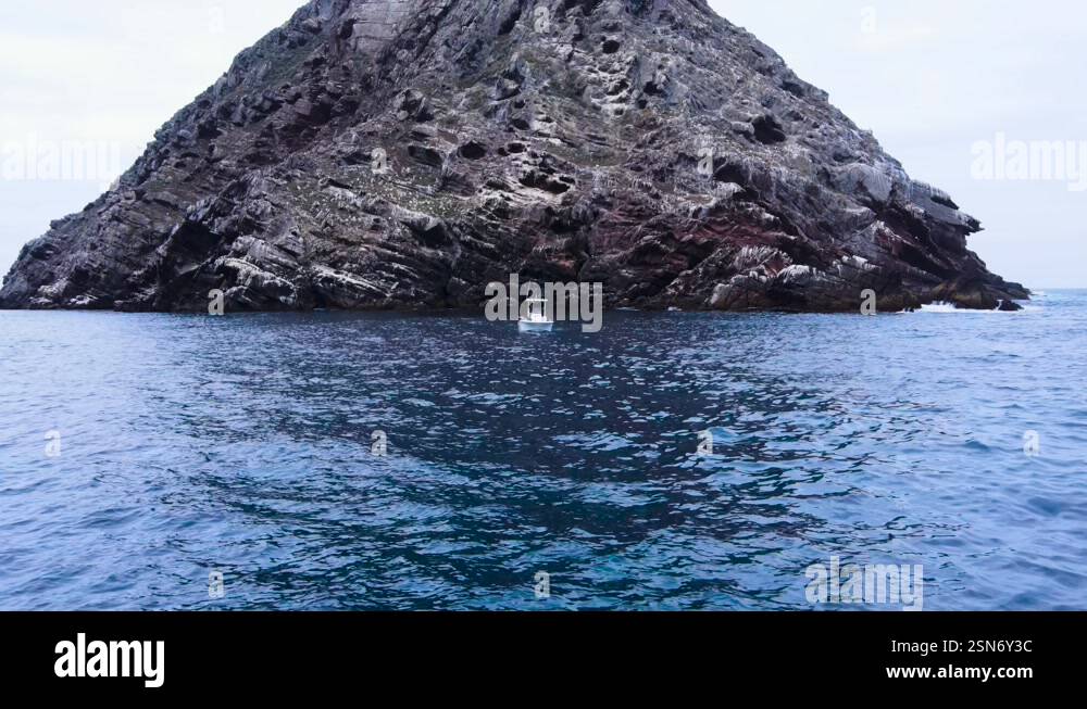 Coronado, Mexico - 09/09/2024: Aerial pullback from boat anchored below ...