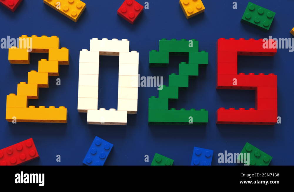 Lego numbers 2025 with some Lego bricks on a blue background Stock ...