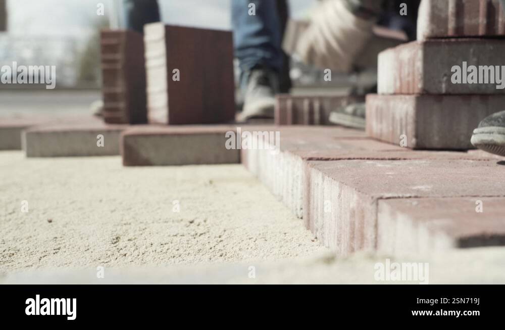 Man laying bricks paving street Stock Videos & Footage - HD and 4K ...