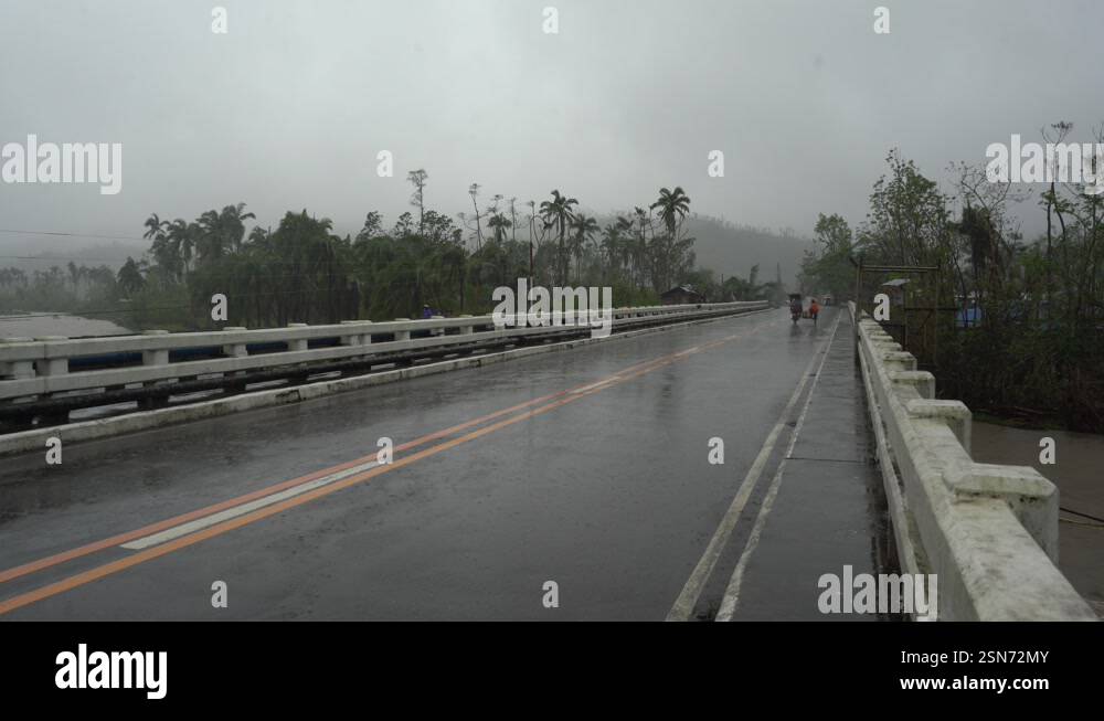 Road Bridge On Rainy Day During Typhoon Rai In Southern Leyte Stock ...