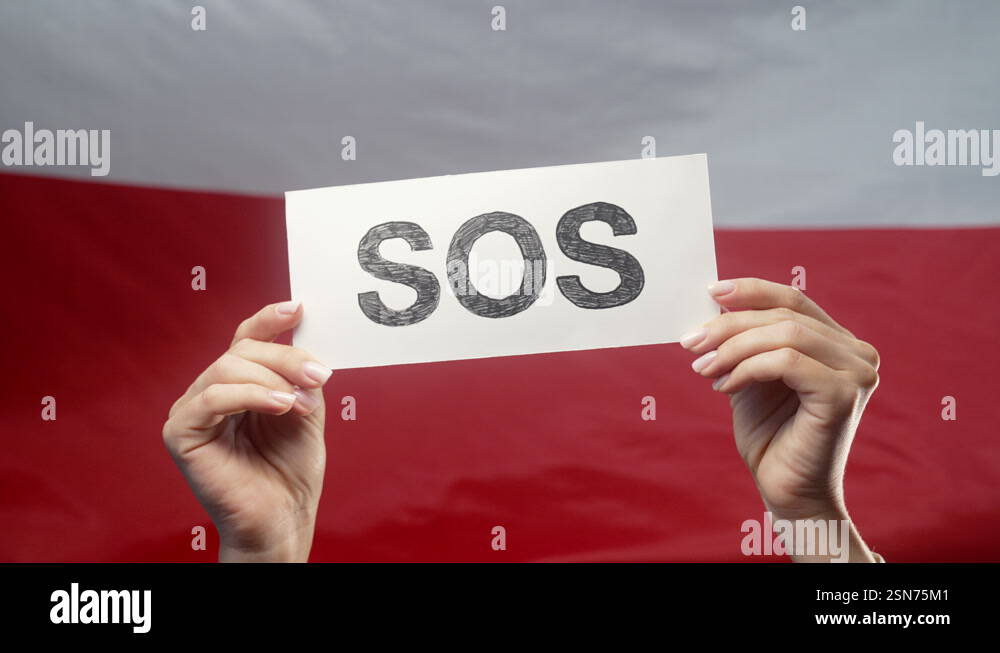 Female hands with SOS, alarm, emergency card on polish National flag ...