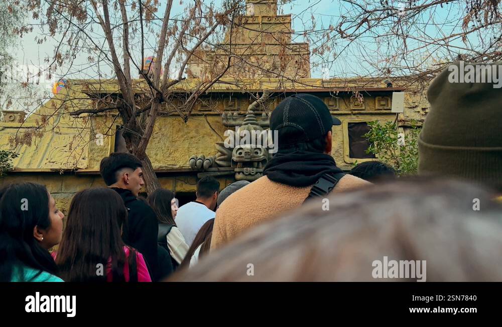 Santiago, Chile - 10/07/2024: Group of people waiting to enter La Monga ...