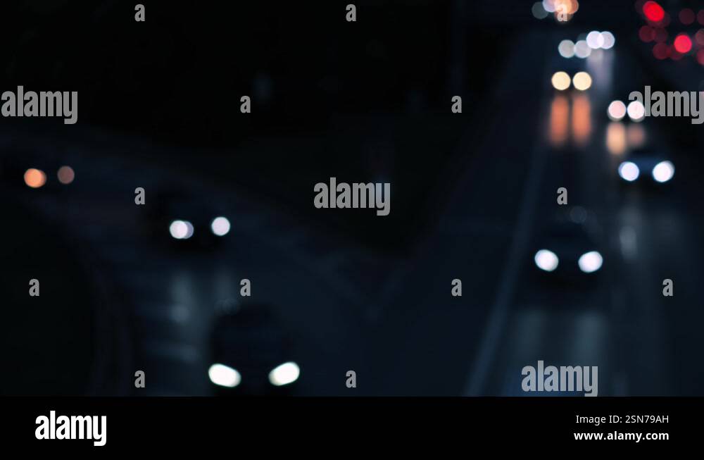 Slow motion driving cars on a german motorway, out of focus rush hour ...