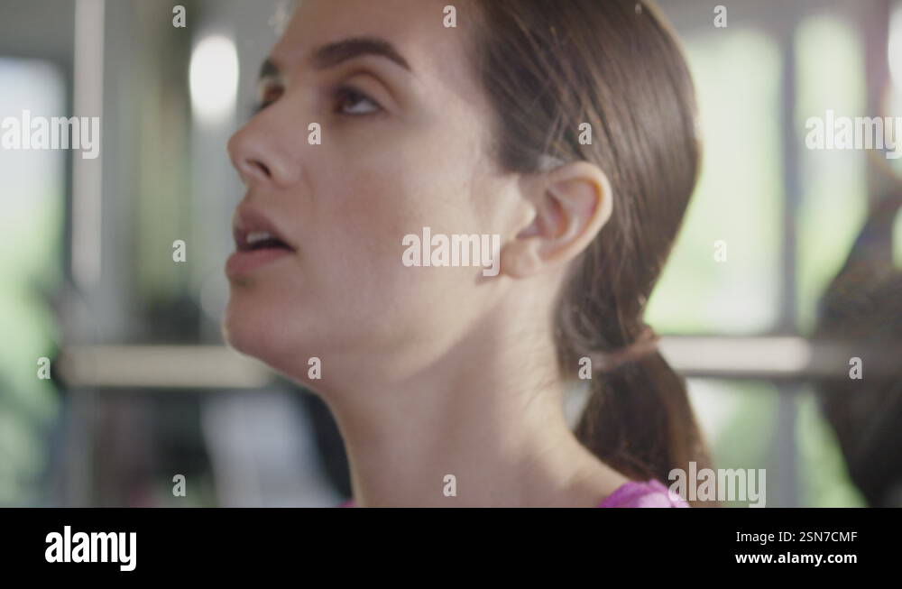 Multiple tight angles of a woman working out in a gym Stock Video ...