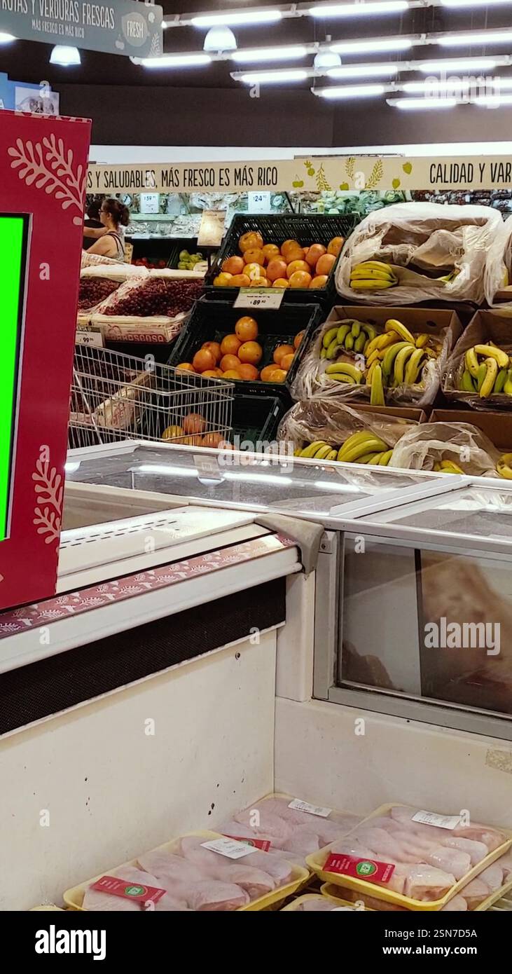 Television with Green Screen at the End of a Supermarket Aisle ...