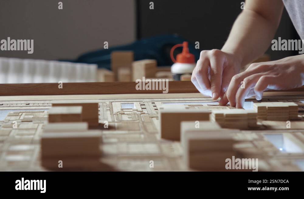 Hands of Professional Man Constructing Architecture Model of Urban City ...
