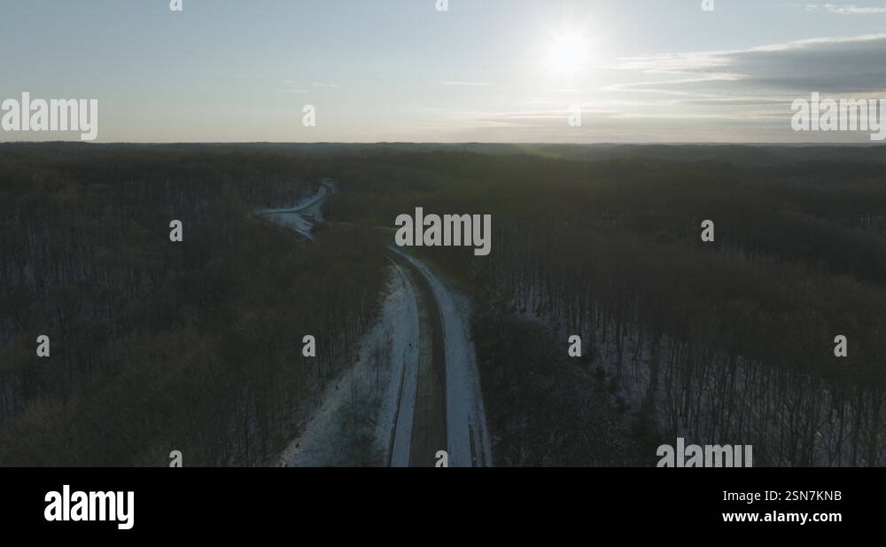 Natchez Trace Scenic Highway, covered in ice and snow, runs through ...