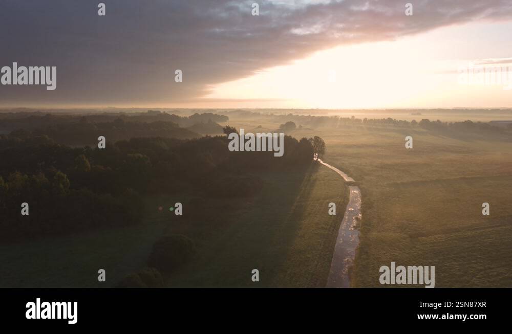 Sun rising over countryside winding Stock Videos & Footage - HD and 4K ...