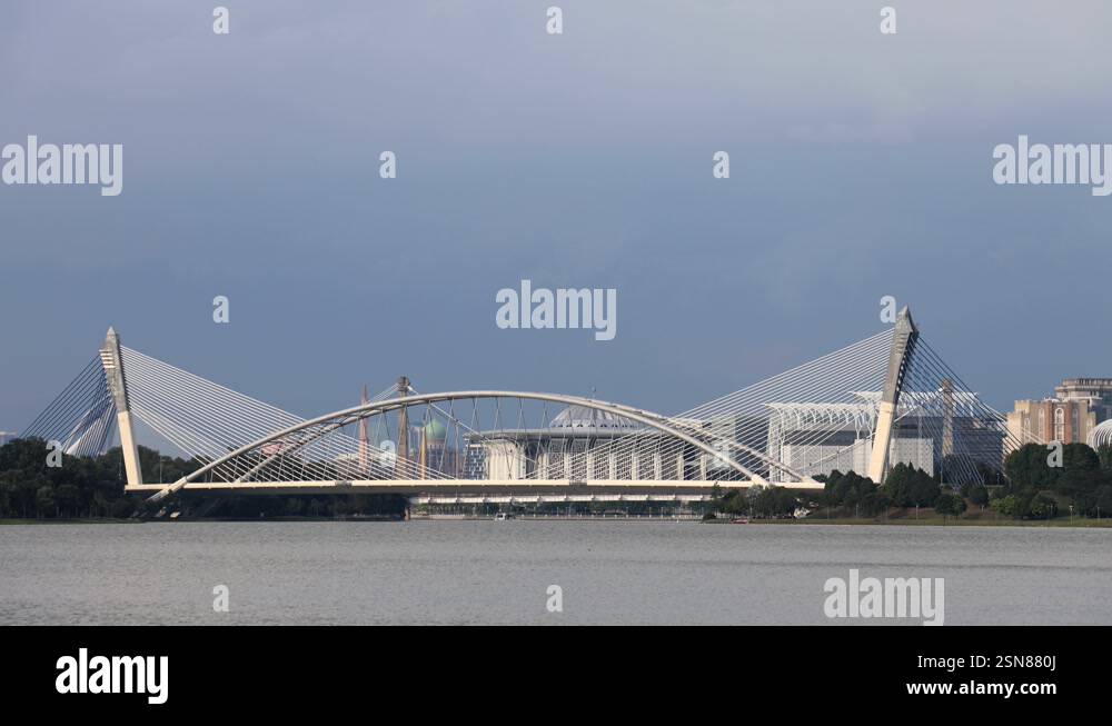 Suspension bridge across lake Putrajaya in Malaysian capitol city ...
