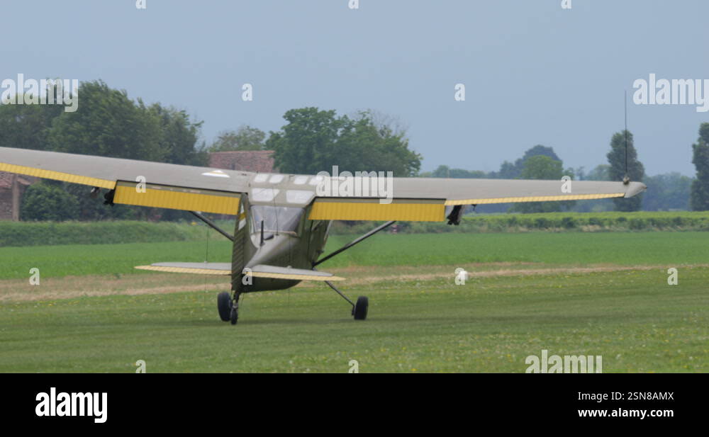 Vietnam War Reconnaissance Aircraft Landing on Remote Grass Runway ...