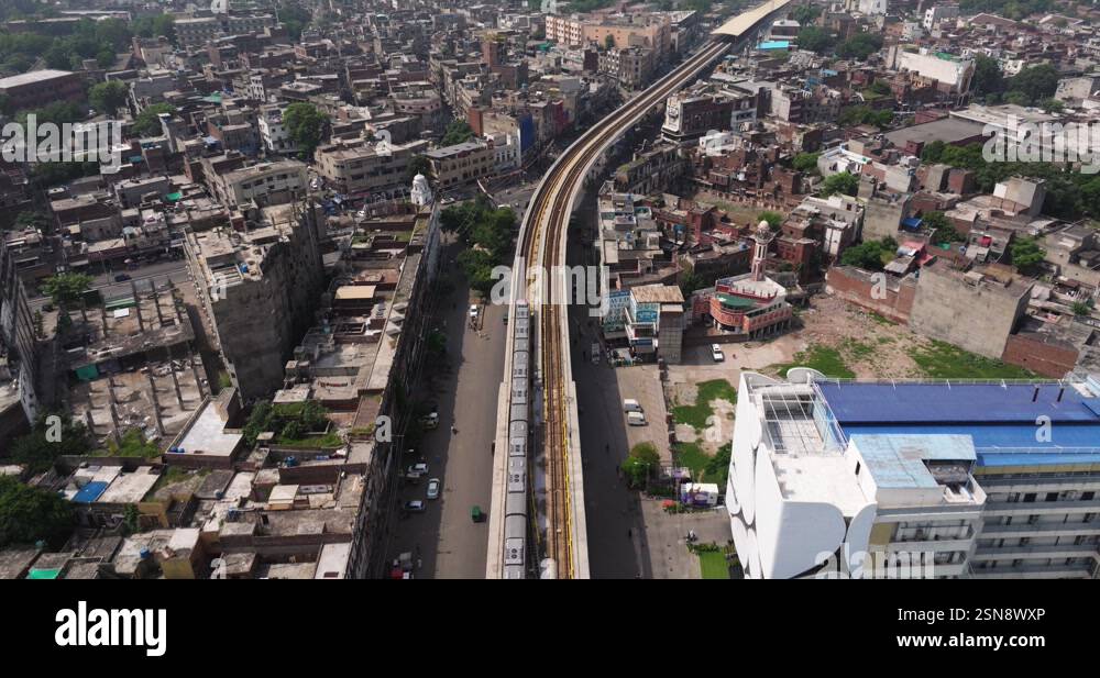 Lahore Subway Train Departs Station in Densely Crowded Pakistan City ...