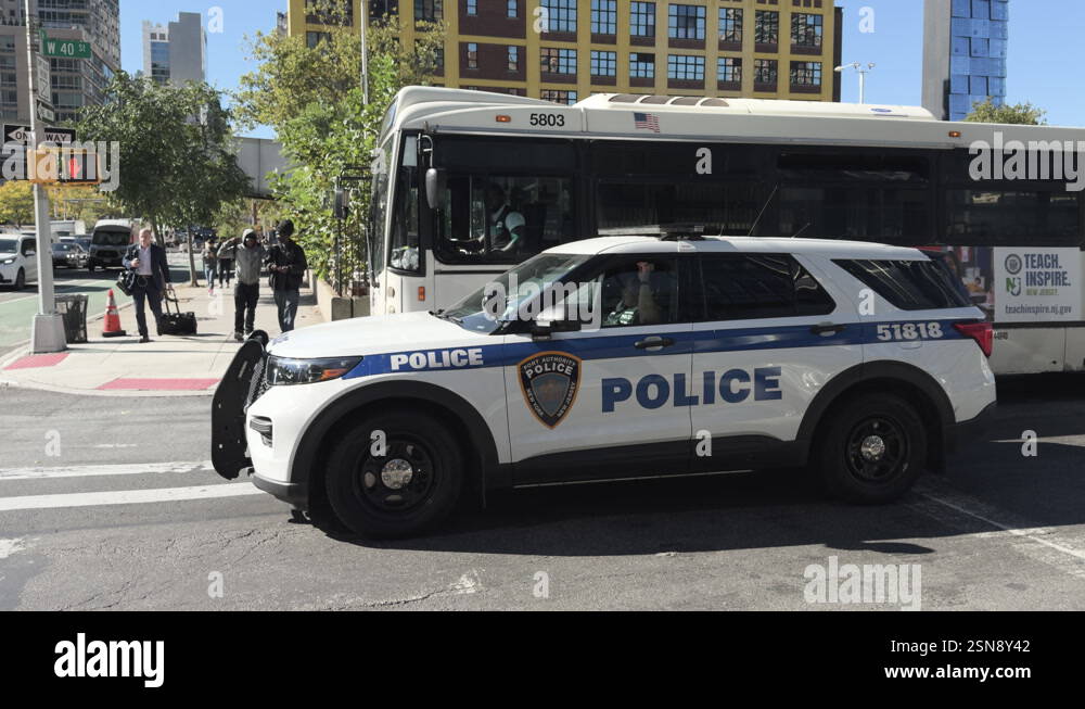 Police vehicle pulls up to crosswalk in downtown New York 4k Stock ...