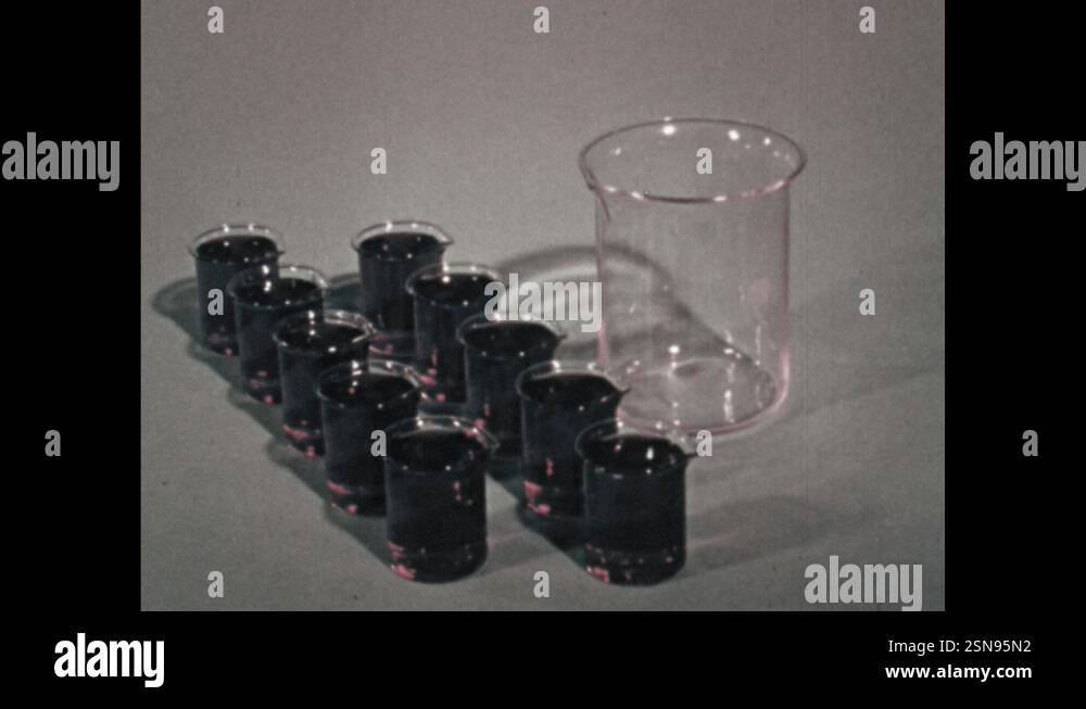 1960s: Four small beakers of solution turn into ten smaller beakers ...