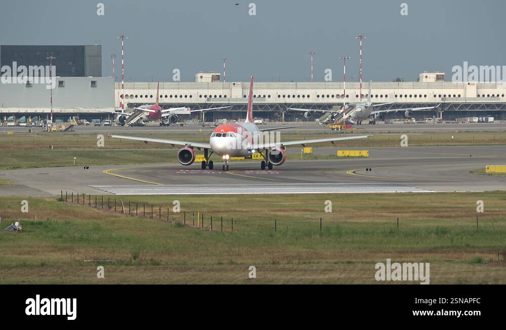 Easyjet Airbus A320 is taxiing at MXP Milano Malpensa international airport Stock Video Footage ...