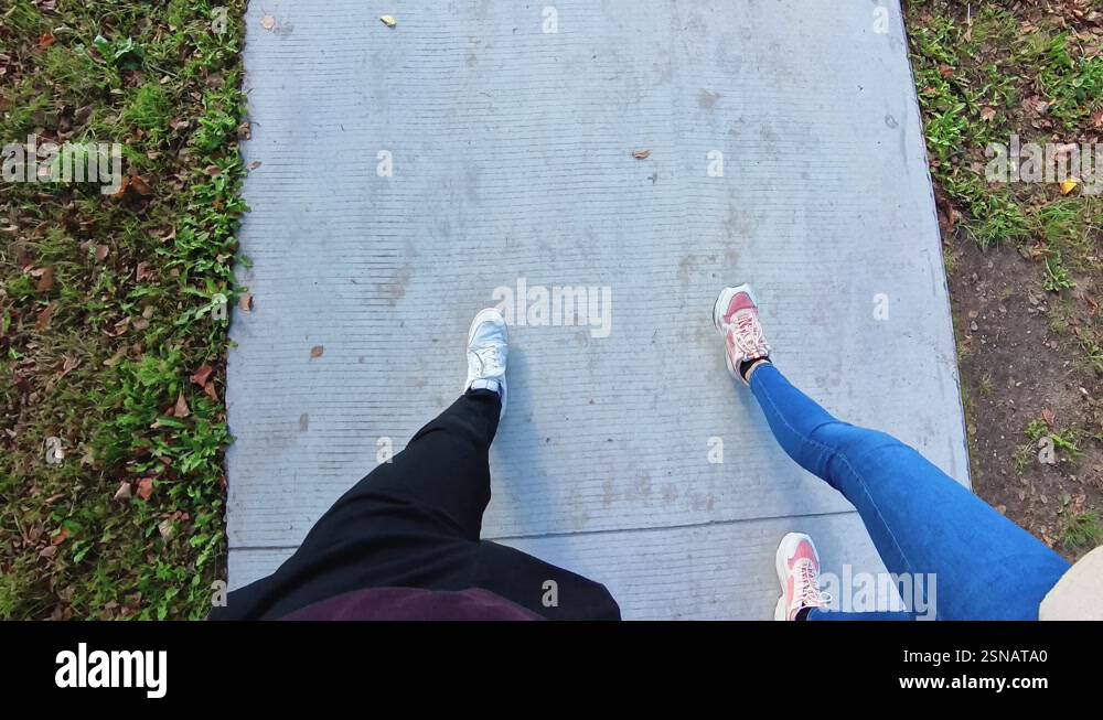 Two people walking side by side Stock Videos & Footage - HD and 4K ...