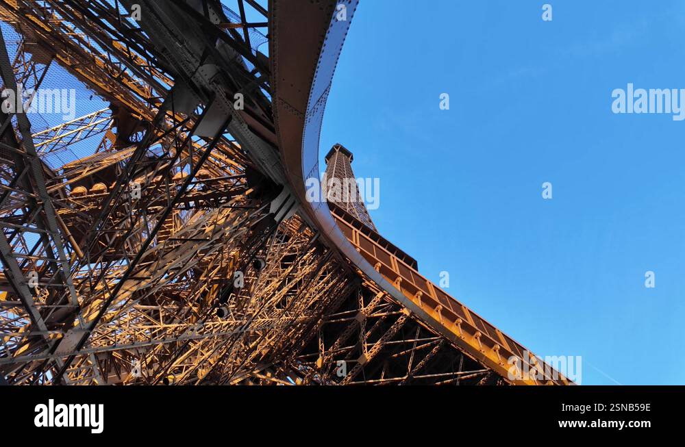 Eiffel Tower Paris France landmark puddle iron structure up-close close ...