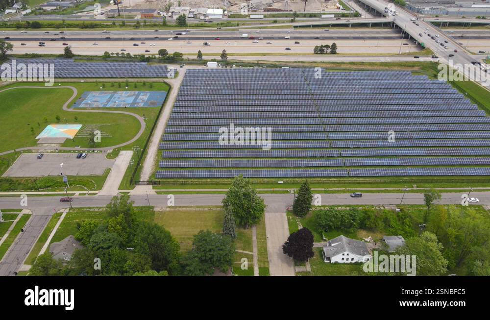 Expansive solar panel field next to O'Shea Playground and freeway in ...