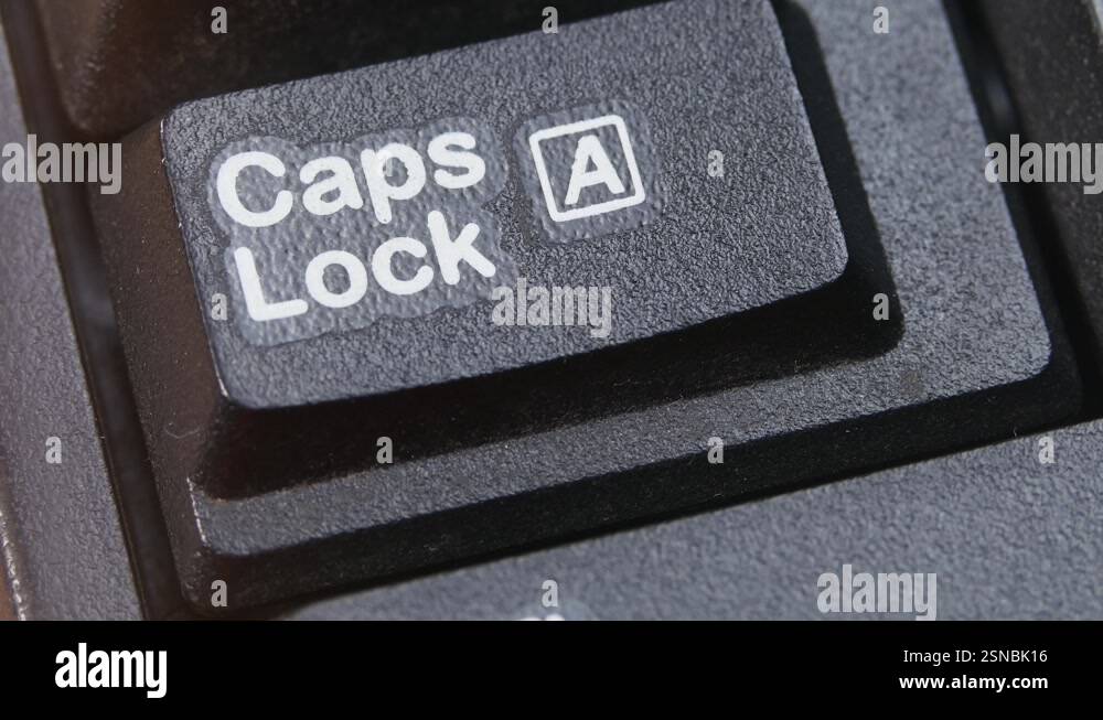 Caps Lock Key on Desktop Keyboard Pressed by Finger Hand Multiple Times ...