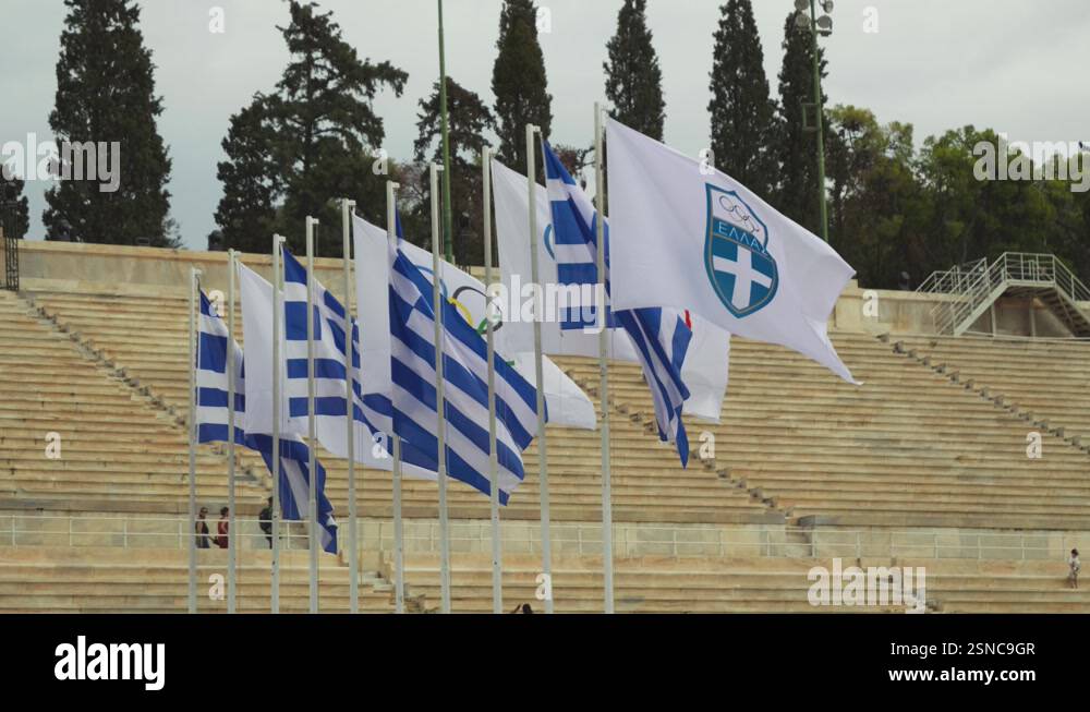 Athens, Greece - 09/19/2024: Stunning view of Greek and IOC flag waving ...
