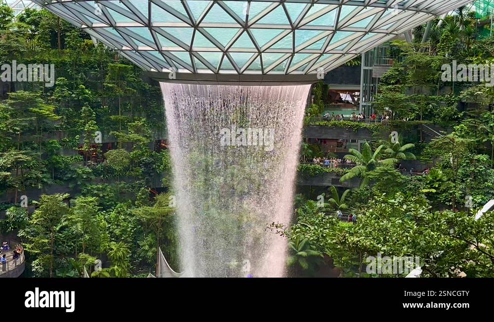 Singapore Jewel Indoor Waterfall Vortex at Changi Airport - panning ...
