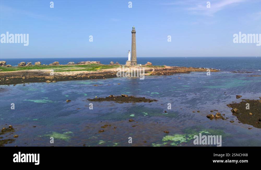 Iconic Phare de l’Île Vierge Lighthouse on Rocky French Coast, Brittany ...
