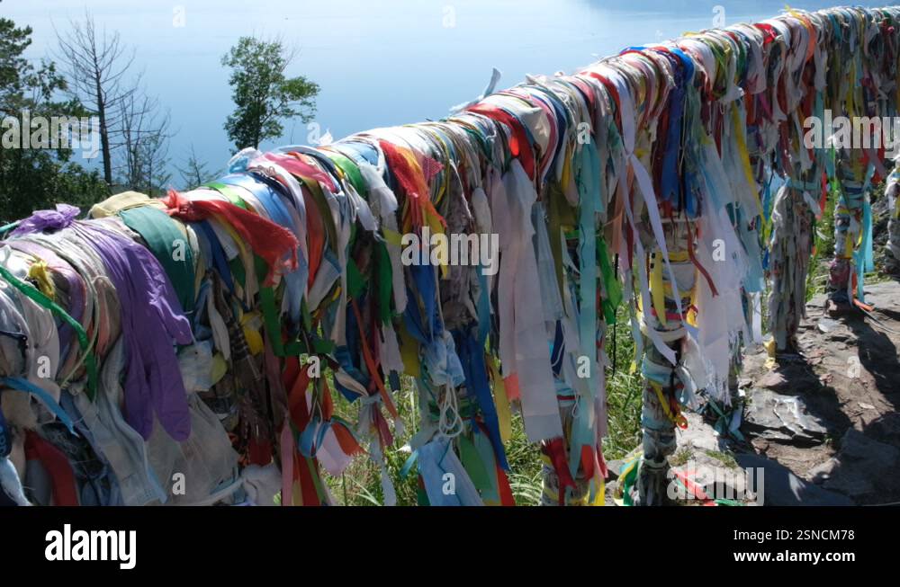 Buddhist ritual place with colored ribbons at the holy site of Lake ...