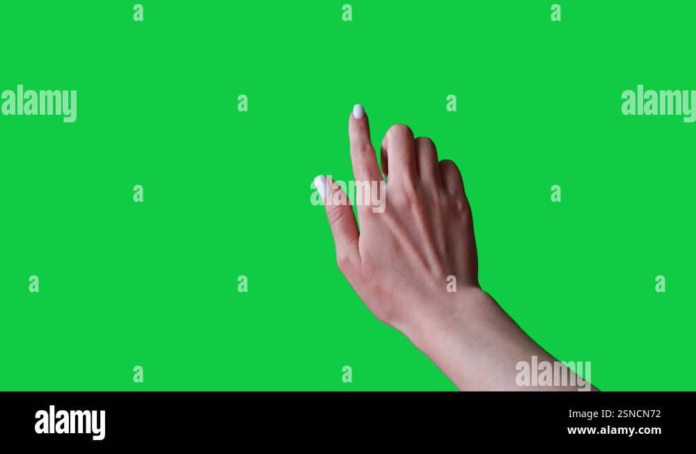 Swipe up gesture. Female hand scrolls up swiping on chroma key green ...