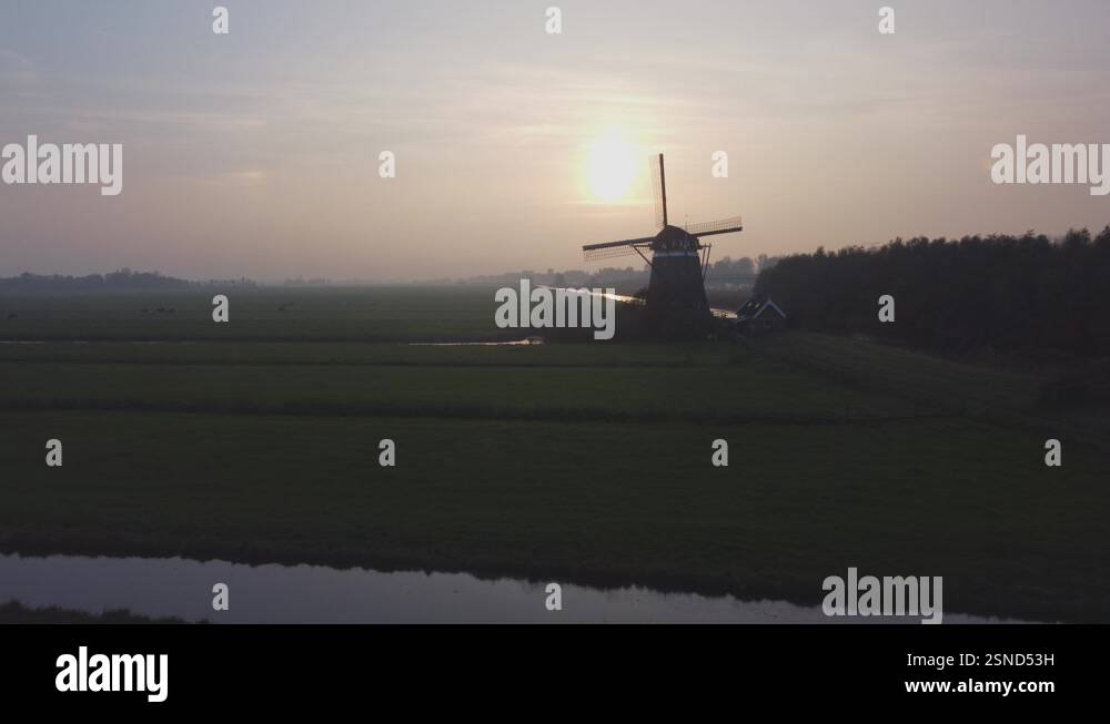Dutch sunset scene, windmill structure, historic iconic building ...