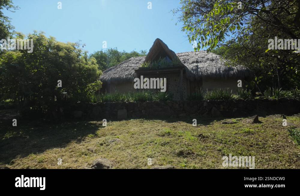 Tizapan El Alto, Mexico - 10/11/2024: Rustic Cob house with thatched ...