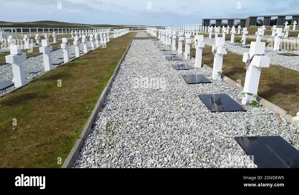 Walking over white crosses and graves of soldiers on darwin cemetery ...