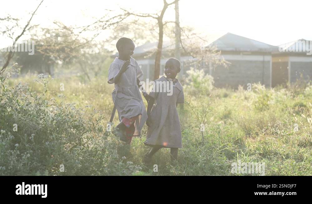 Kaijado, Kenya - 08/05/2024: Young girls playing together in an African ...