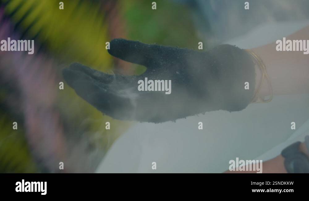 Dry Ice Evaporation in Gloved Hand Stock Video Footage - Alamy