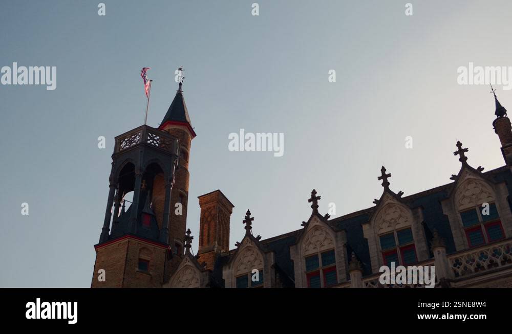 Historic Belgian building with ornate gothic architecture and a tall ...