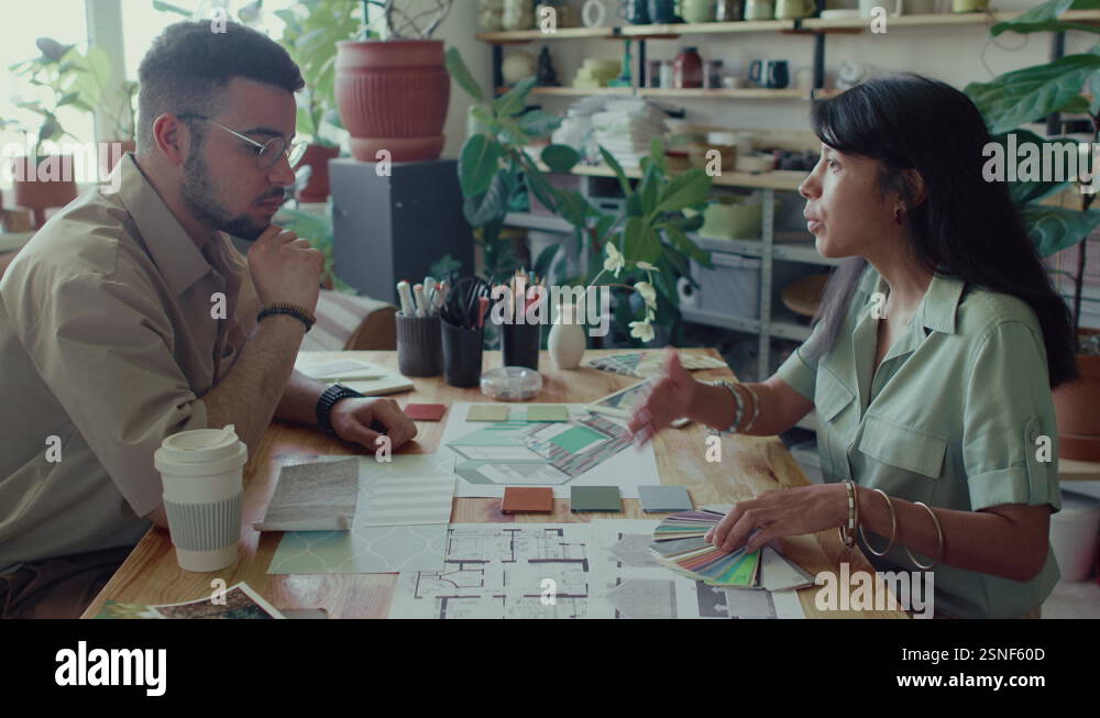 Two Colleagues Choosing Colour Palettes while Designing Room Interior ...