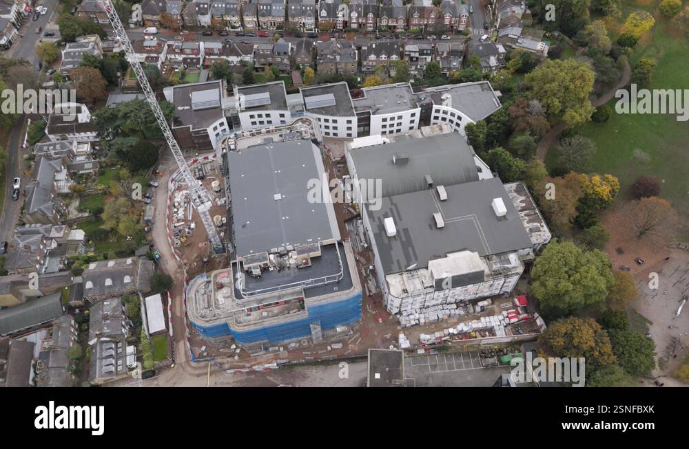 Orbital view of Ealing Studios redevelopment capturing construction progress Stock Video Footage ...
