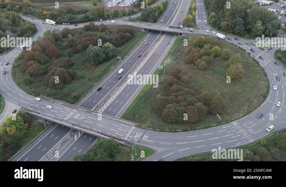 Orbital aerial view of traffic navigating the Gordano Interchange on ...