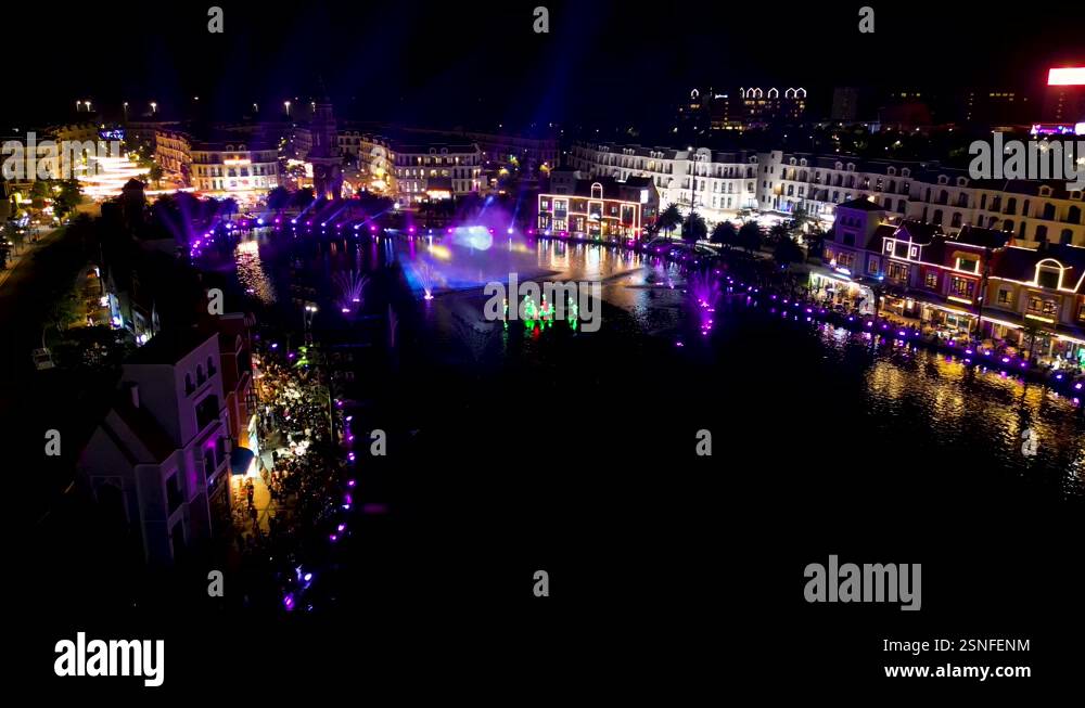 Laser light show at night over Love Lake in Phu Quoc Island. High ...