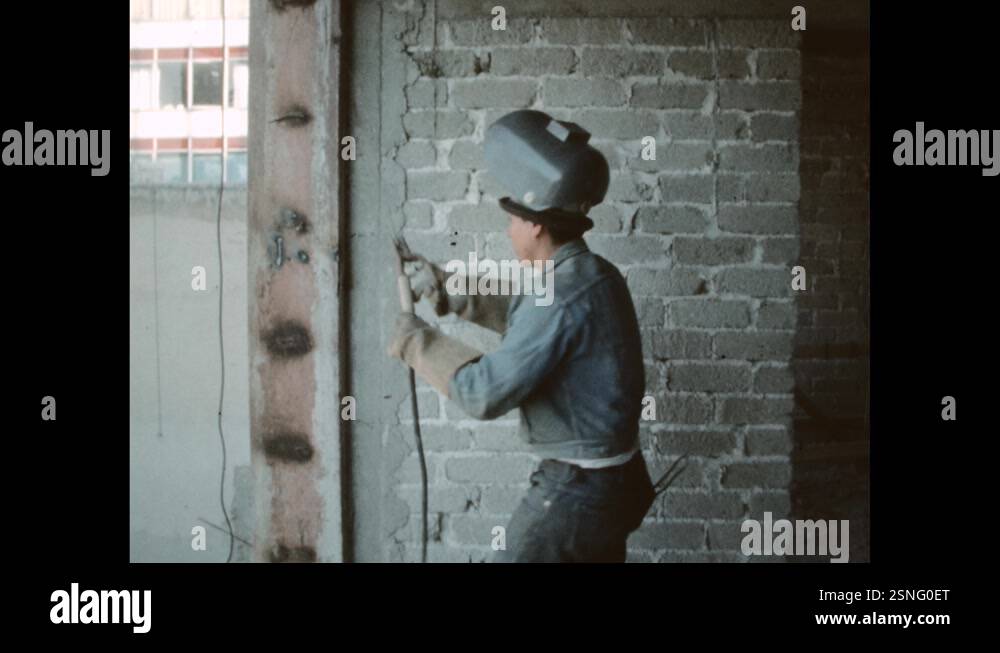 1960s: Construction workers prepare for a historic building project ...