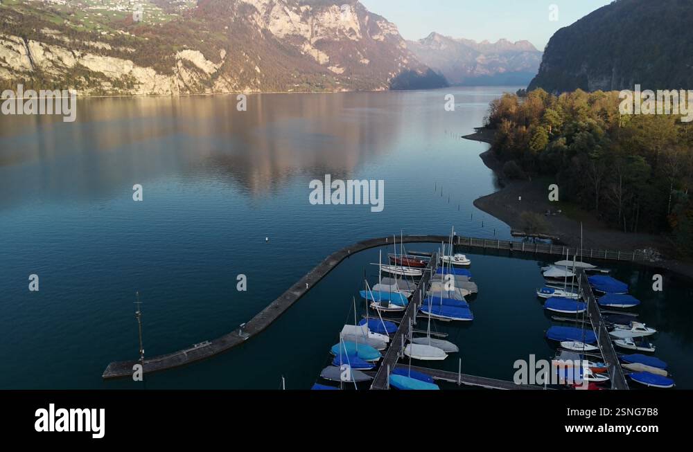 Lake Walen fishing boat marina port Walensee nature landscape Alps ...
