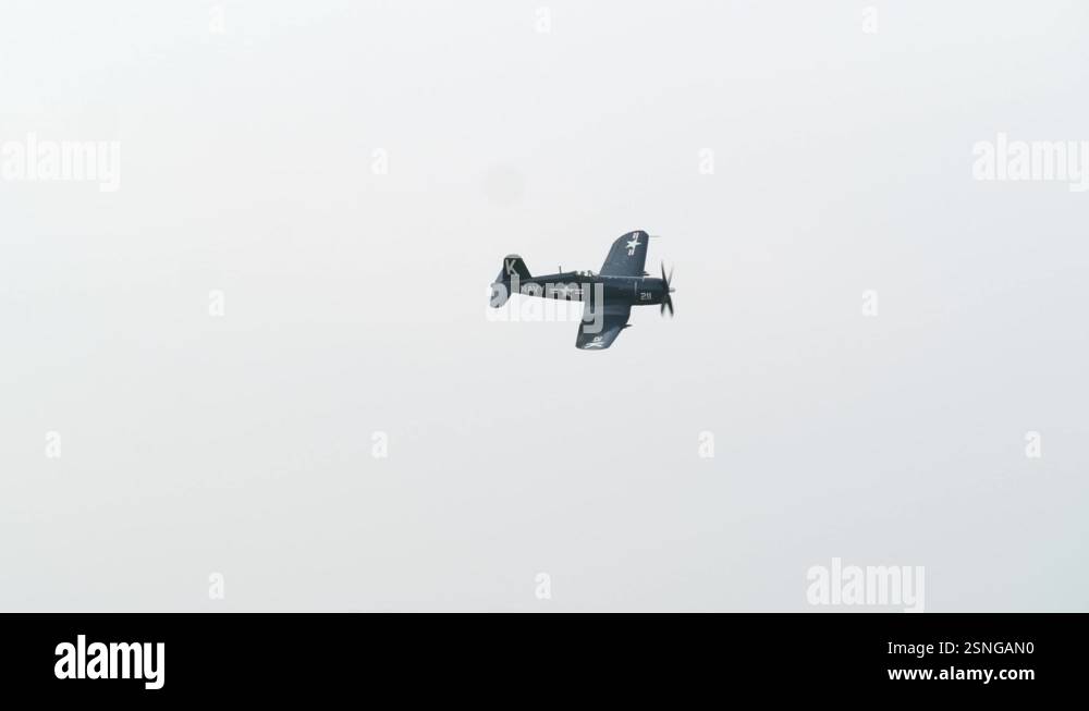 Flyby of a Navy F4U Corsair World War II Fighter Airplane TRACK Stock ...