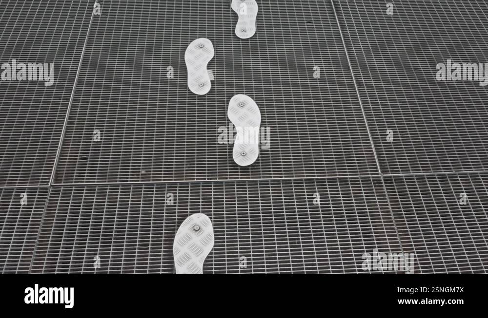 Way forward. Footsteps. Step by step. Footprints. Feet following the ...