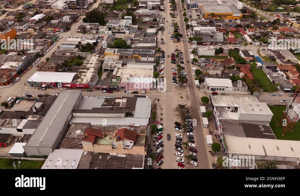 Driving cars on main street between Brazil and Uruguay in Chui City ...