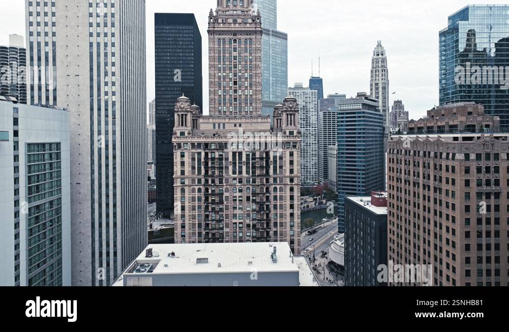 Aerial overview of iconic tower framed by high-rises in downtown ...