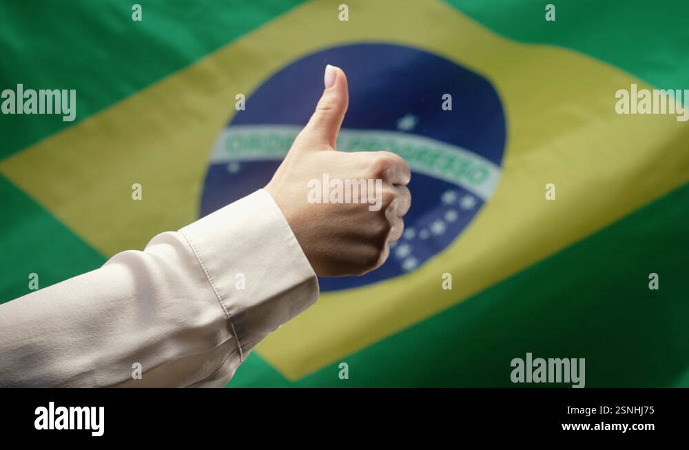 Woman Makes Hand Sign Like, Thumb Up Gesture on brazilian flag ...