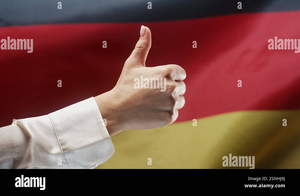 Woman Makes Hand Sign Like, Thumb Up Gesture on germany flag background ...